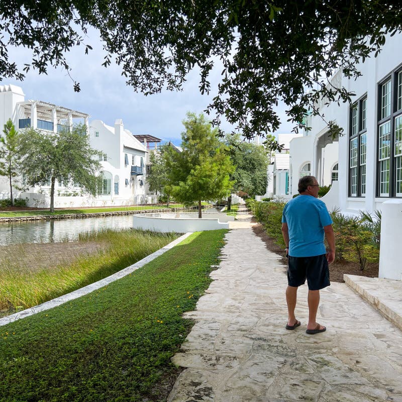 A Walking Path with Water Feature and Homes in Alys Beach, Florida ...