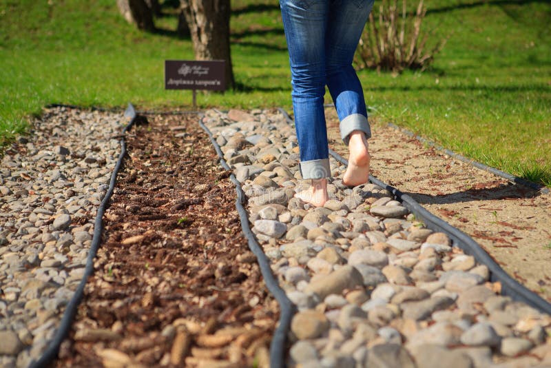 Walking on pebbles stock photo. Image of person, stone - 56825480
