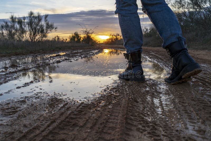 Walking through a Puddle with Military Boots. Stock Image - Image of ...