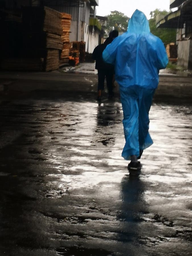 Walking in the rain editorial photography. Image of rain - 174651877