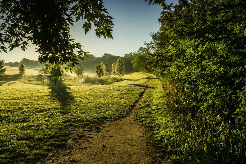 Walking or Running Trail in a City Park at Sunrise Stock Photo - Image ...