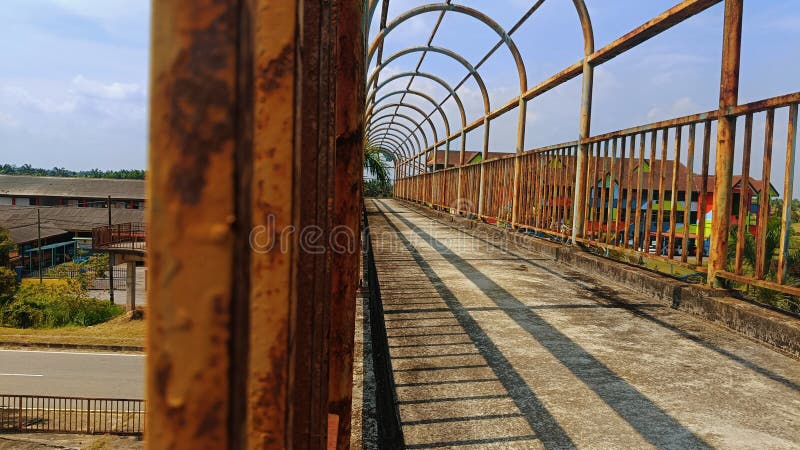 Walking on a Rusty, Abandoned, and Uncovered Pedestrian Bridge Stock ...