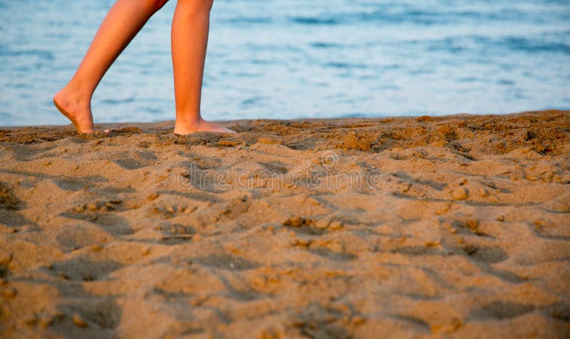 Walking on sand beach stock image. Image of beach, postcard - 57612027