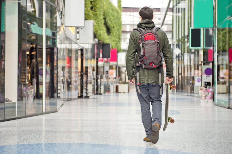 Walking through a Shopping Mall Stock Photo - Image of saunter ...