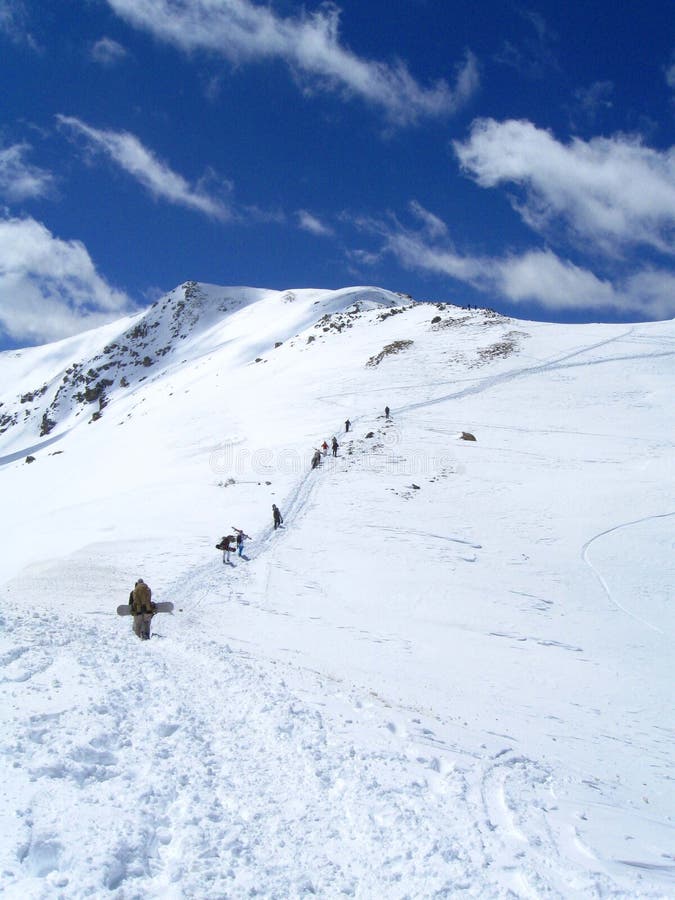 Walking the Snowy Line stock photo. Image of cold, friendship - 73814208