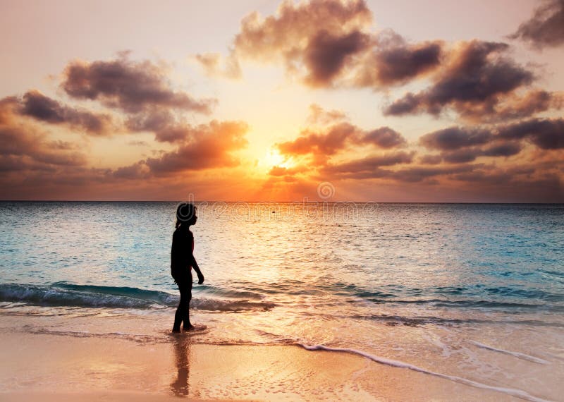 Walking at sunset stock photo. Image of horizon, beach - 20258566