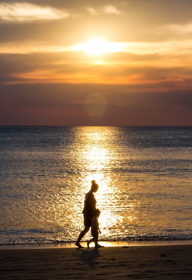 Walking in sunset stock photo. Image of shore, colorful - 55931260