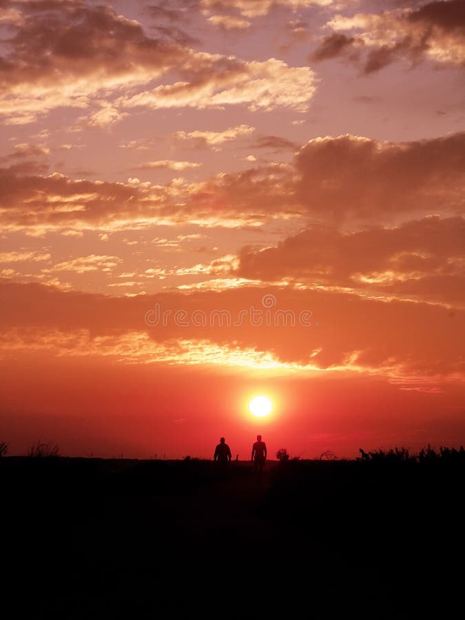 Walking on sunset stock photo. Image of recreation, clouds - 105981986