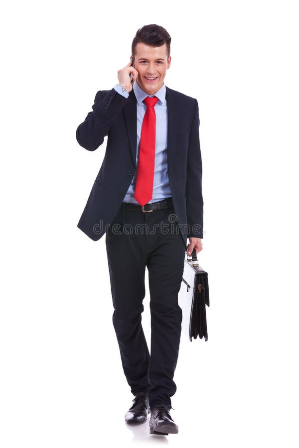 Man Walking and Talking on Phone Stock Image - Image of phone, black ...