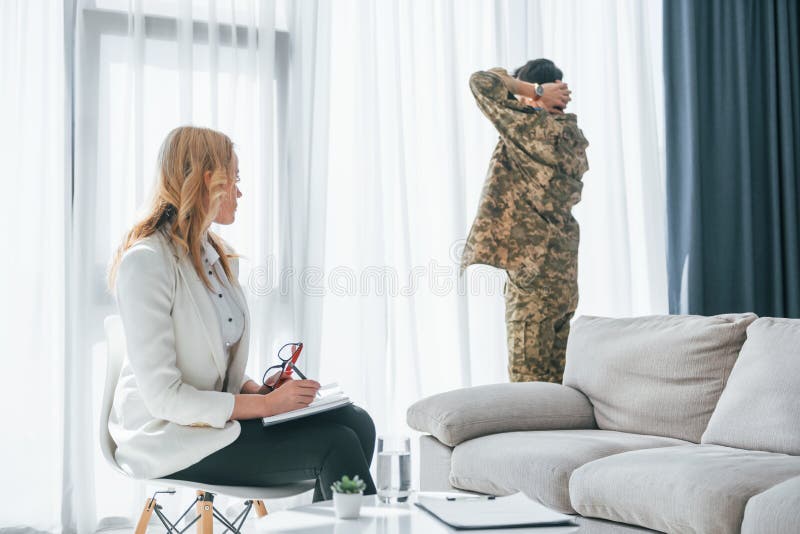 Walking and Thinking. Soldier Have Therapy Session with Psychologist ...