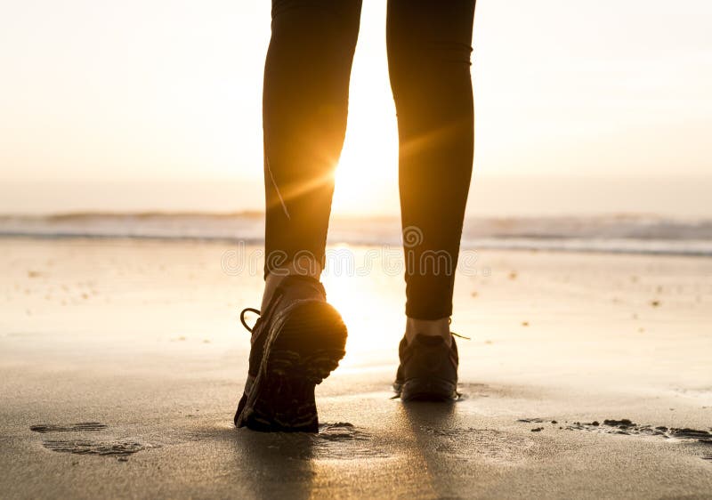 Walking to the sunset stock photo. Image of adult, active - 85098674