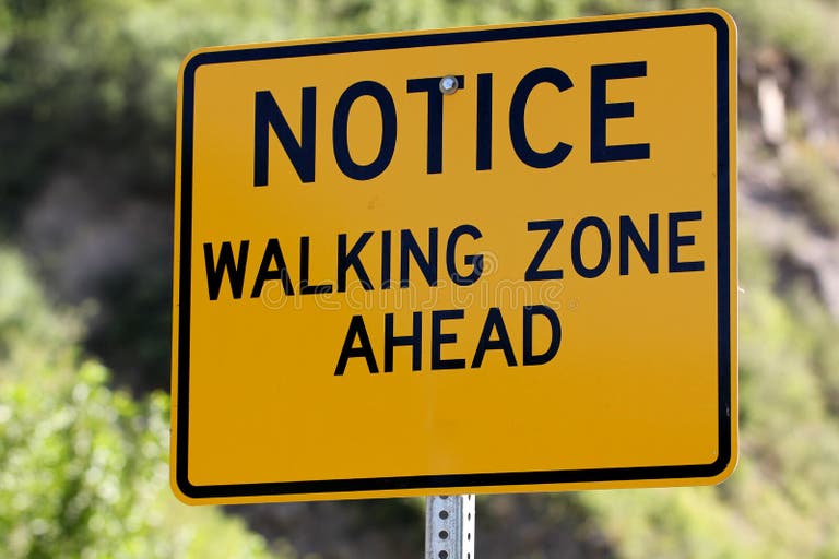 Walking Zone Ahead Sign stock image. Image of careful - 15620535