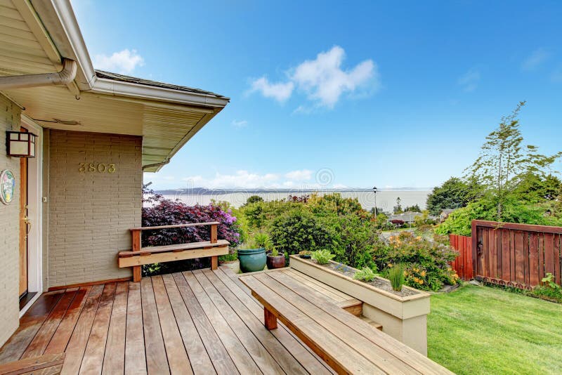 Porch with Water View and Grey House. Stock Image - Image of outdoor ...