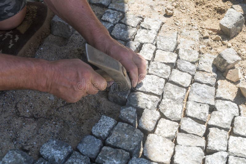 A walkway is being repaved stock image. Image of nature - 154321041