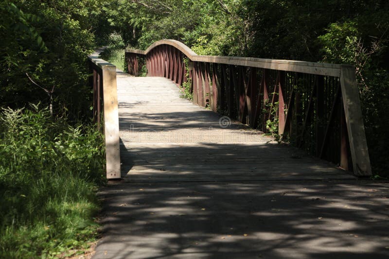 Walkway Bridge Path Made of Wood with Brown Railing that Goes Over ...
