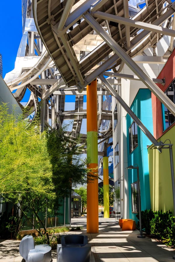 A Walkway with a Green and Yellow Pole in the Middle Stock Image ...
