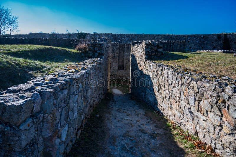 Walkway in the Ground between High Stone Walls. Stock Photo - Image of ...