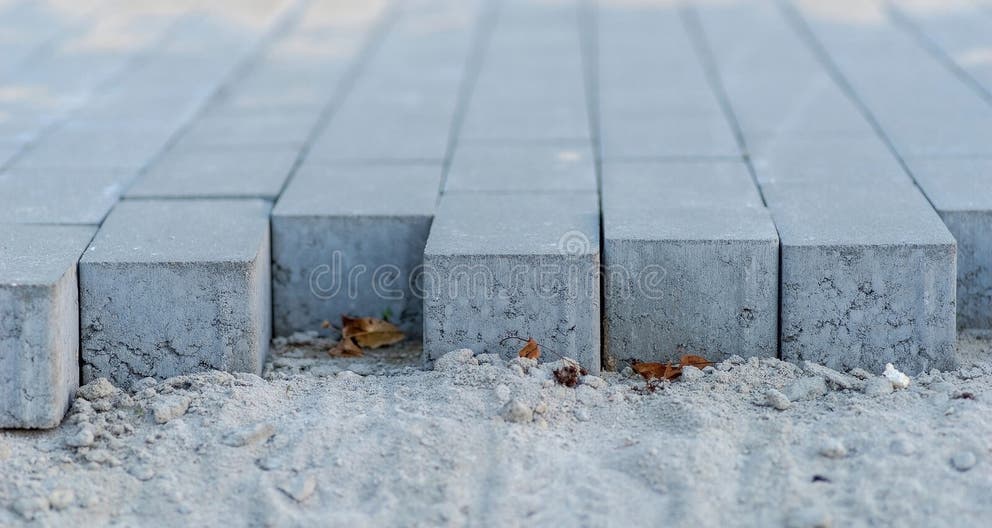 The Sidewalk is Being Constructed - it is Being Laid with Concrete ...