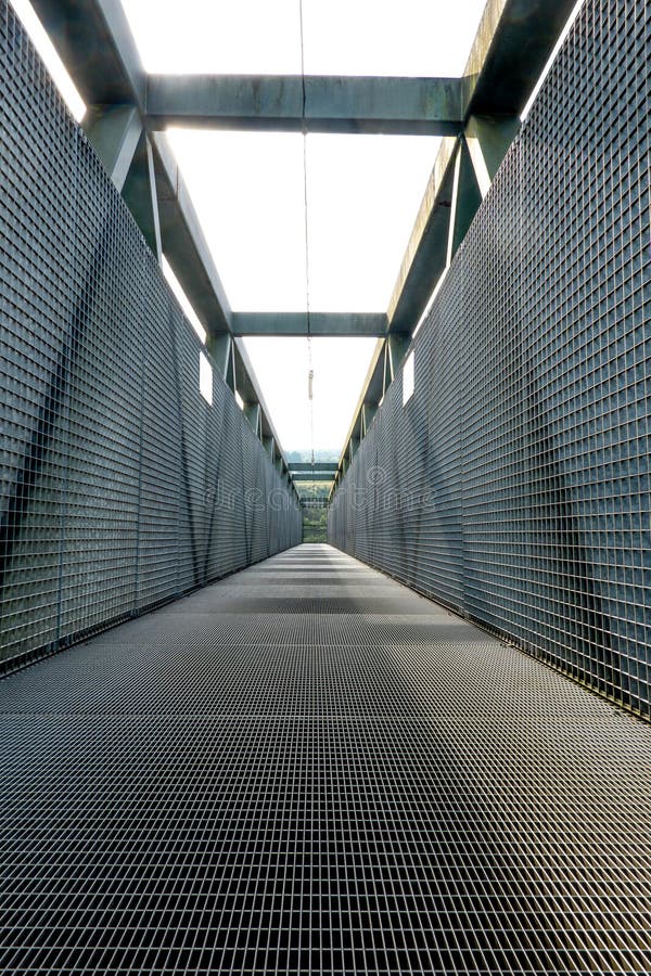 Walkway with Metal Grid Flooring and Structural Framework in an ...