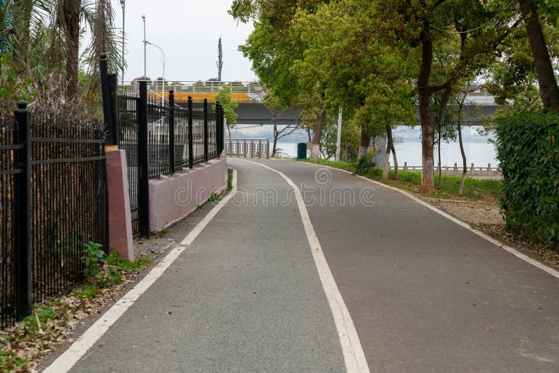 Walkway in the modern city stock image. Image of park - 286917621