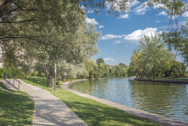 Walkway in the Park Along the River. Beautiful Landscape of Summer ...