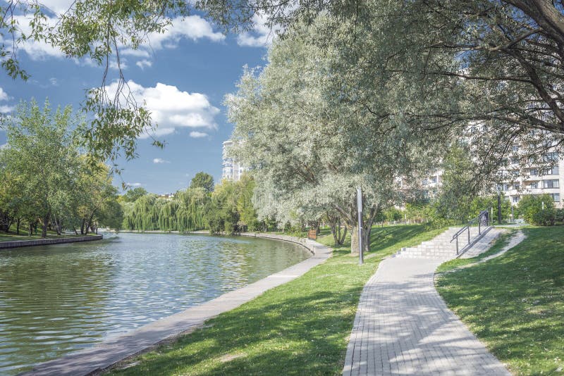 Walkway in the Park Along the River. Beautiful Landscape of Summer ...
