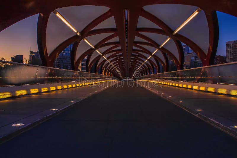 Walkway on the Peace Bridge at Night Editorial Photo - Image of clouds ...