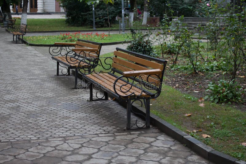 A Walkway through a Pleasant City Park. Bench Park with Path Way Stock ...