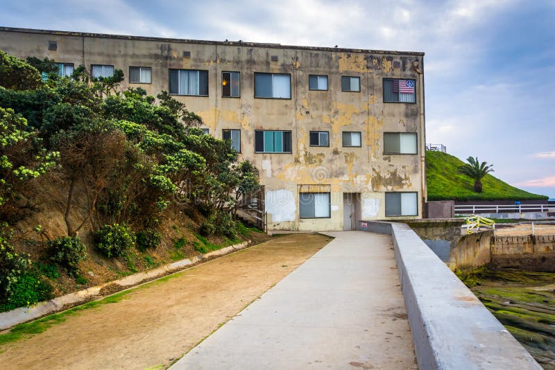 Walkway and Run-down Apartment Building Stock Photo - Image of building ...