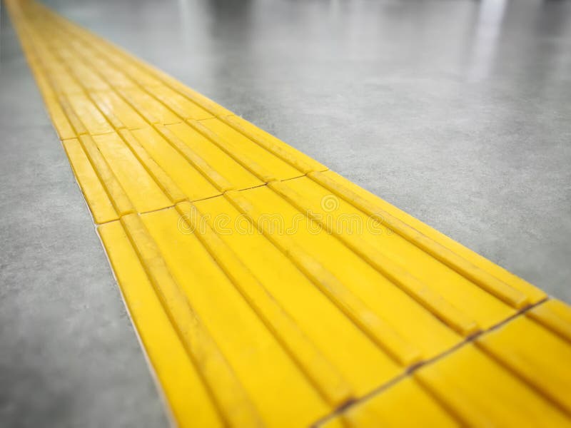 Walkway or Yellow Tactile Tiles for the Blind in the Urban Environment ...