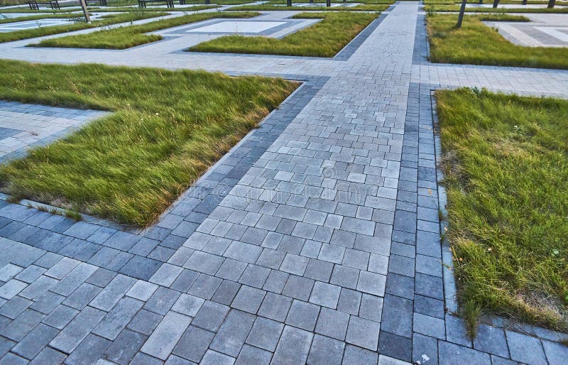 Walkways are Tiled. Newly Built Cottage with Pavement Paths. Textural ...