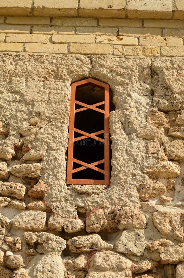 Wall of an Ancient Building Made of Stone with a Window Stock Photo ...