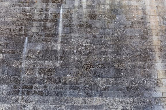 Wall of Ancient Castle Bastion Clad with Stone Blocks, Fragment Stock ...