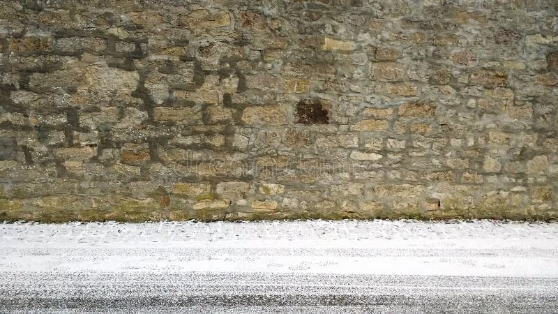 Wall Background with Frosty and Snowy Street in Front Stock Photo ...