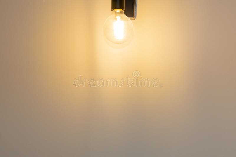 Wall Background with Hanging Bright Lamp Stock Photo - Image of lamp ...