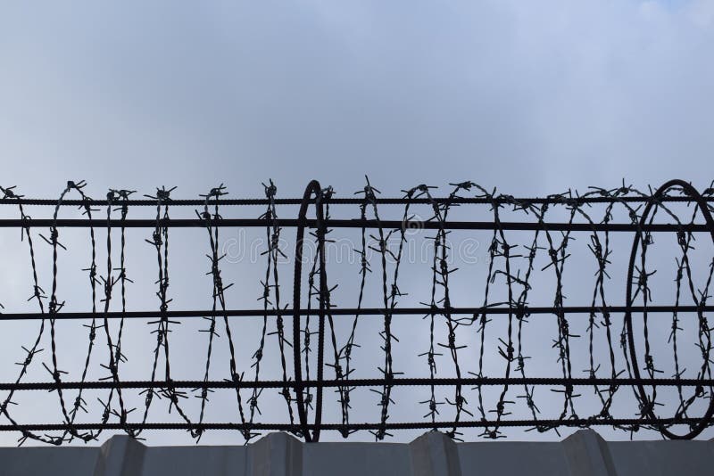 Wall Barbed Wire Fence for Security Stock Image - Image of wire, wall ...