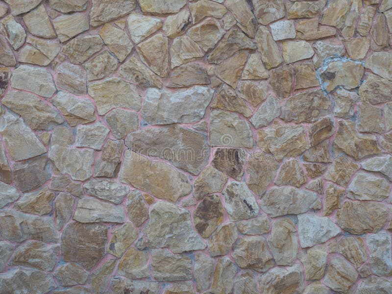 Wall with Beige Randomly Laid Out Stonework. Non-seamless Texture. Full ...