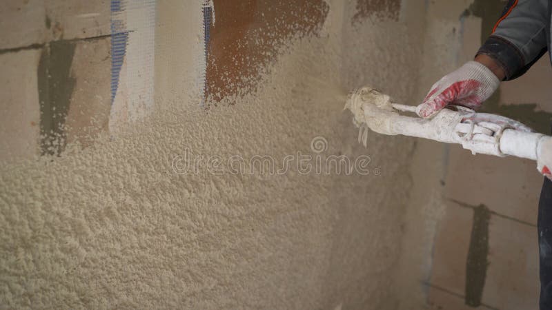 A Wall Being Covered in a Layer of Plaster Stock Photo - Image of ...