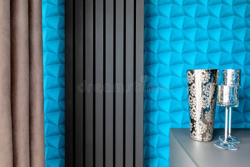 A Wall with Blue Patterned Wallpaper. a Modern Gray Radiator ...