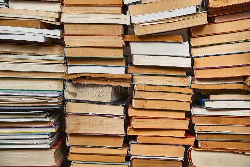 Wall of books piled up stock image. Image of study, messy - 231825369