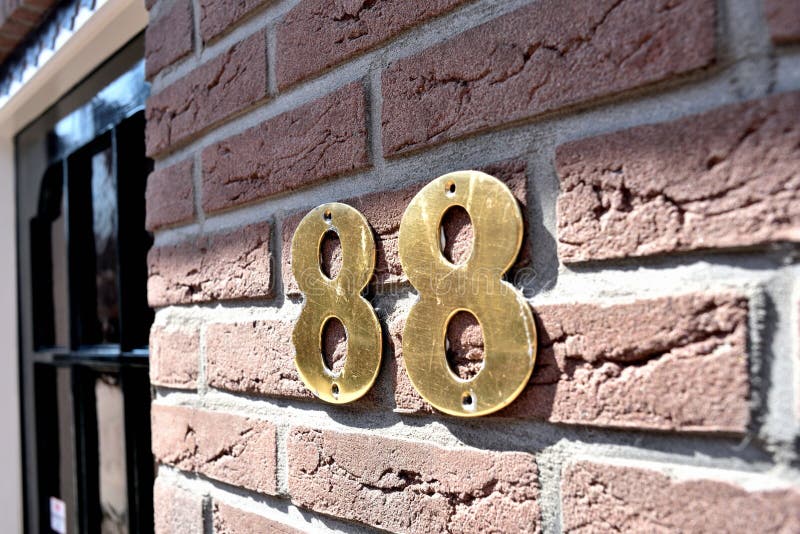 Wall in a Brick Building with a Painted Number 88 on it Stock Photo ...