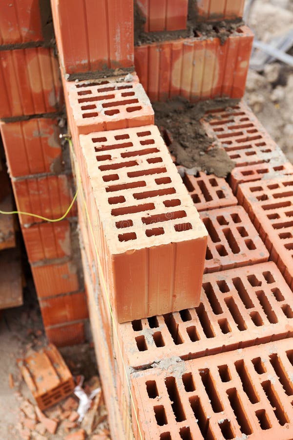 Wall Building with Professional Bricks, Construction Site of New House ...