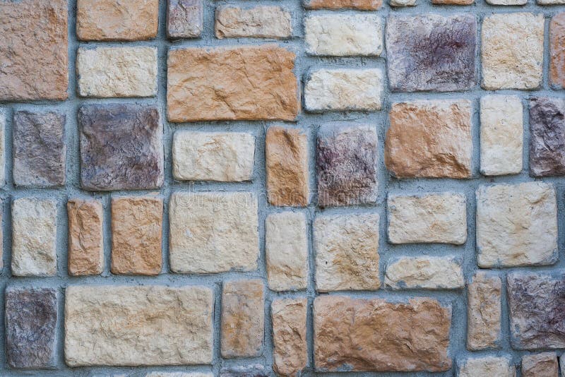 Wall Built of Rectangular Stones of Different Colors and Textures Stock ...