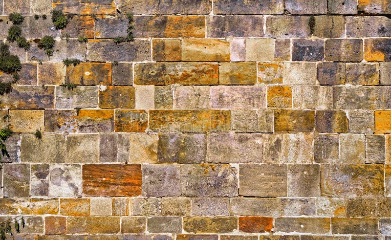 The Wall Built of Regular Stones Background. Texture of Old Stonework ...