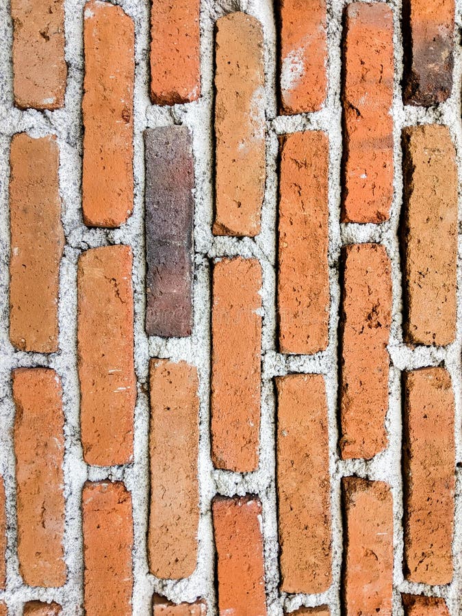 A Wall Built Using Stacked Bricks Stock Image - Image of cobblestone ...