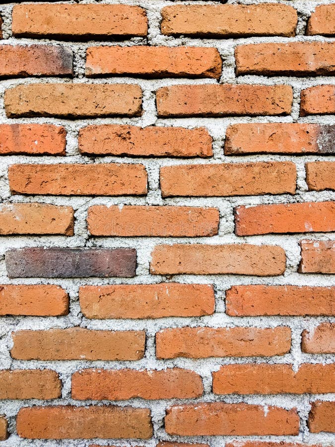 A Wall Built Using Stacked Bricks Stock Image - Image of bricks ...