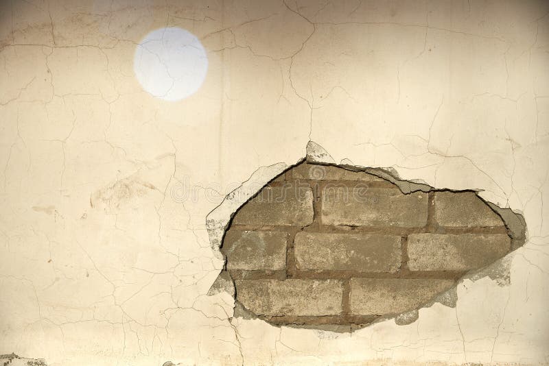 The Wall Caved in, the Plaster and the Bricks are Visible. Stock Image ...