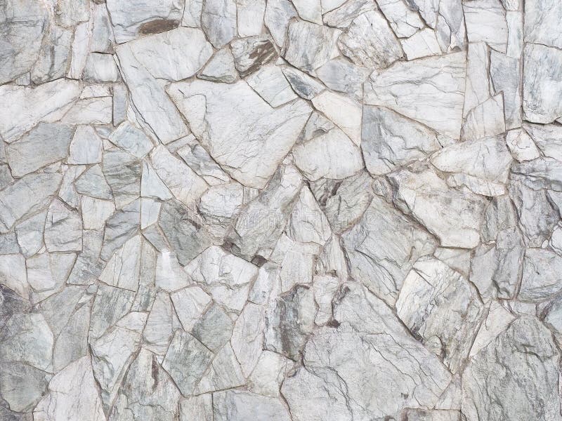 Wall Clad with Gray Granite Spotty Shards of Different Sizes. Texture ...