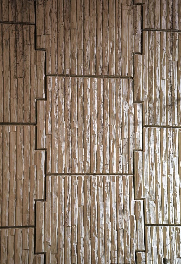 The Wall is Clad with Light Carved Relief Stone Stock Image - Image of ...