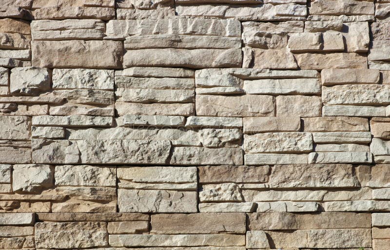 Elegant Cladding Wall Made of Natural Stone Bricks. Color is Brown with ...